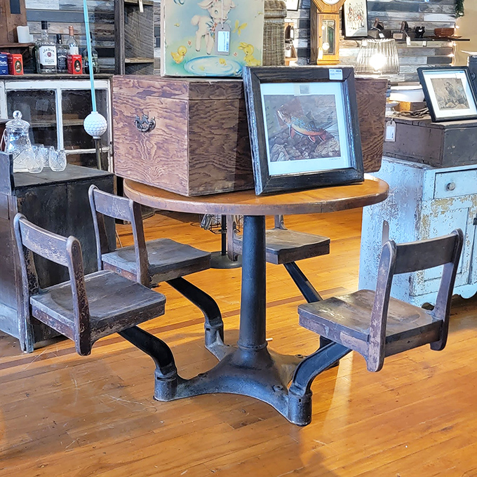 School was never this cool! This vintage cast iron desk with swing-out seats is industrial chic before that was even a thing.