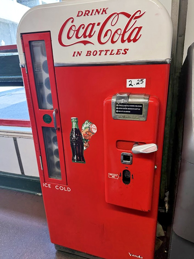 That vintage Coca-Cola machine isn't just decoration&mdash;it's a time machine dispensing cold nostalgia alongside your favorite fizzy companion.