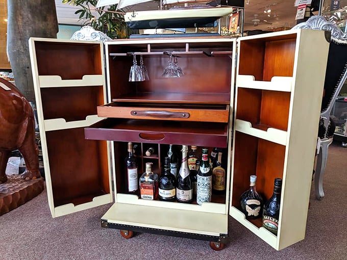The ultimate home bar revelation&mdash;this vintage cabinet transforms "I'll have a drink" into "Welcome to my speakeasy."