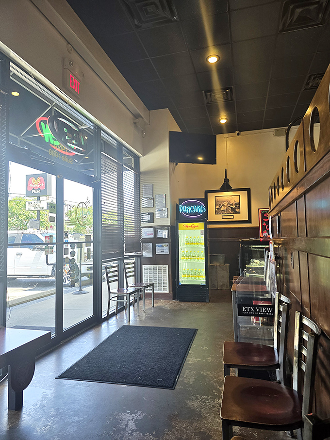 The entrance that promises pancake paradise just beyond—complete with a neon sign that acts as a beacon for the breakfast-obsessed.