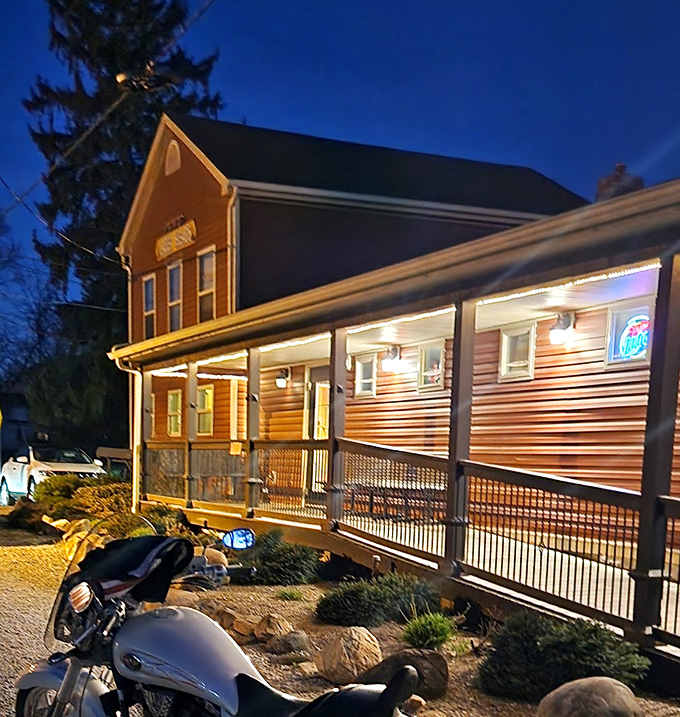 As evening falls, the warm glow from Lager Heads beckons like a lighthouse for the hungry and thirsty alike.