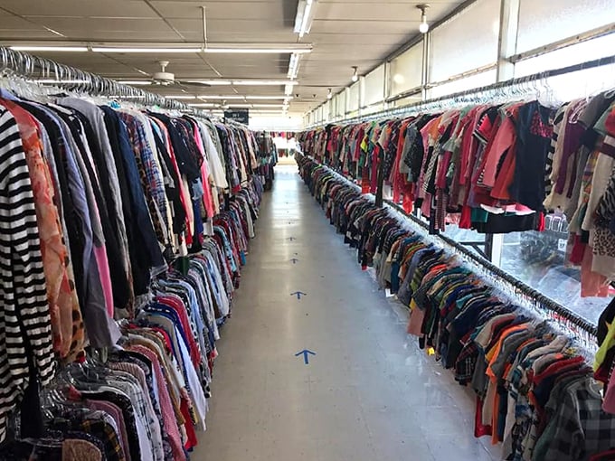 The clothing corridor stretches like a textile river. Navigation tip: start at one end and let the current of bargains carry you.