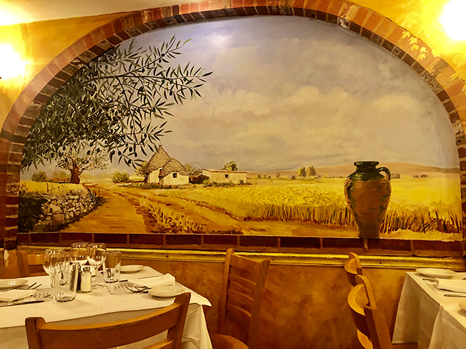 The mural doesn't just depict the Italian countryside &ndash; it's a window to another world where olive trees sway and pasta is always perfectly al dente.