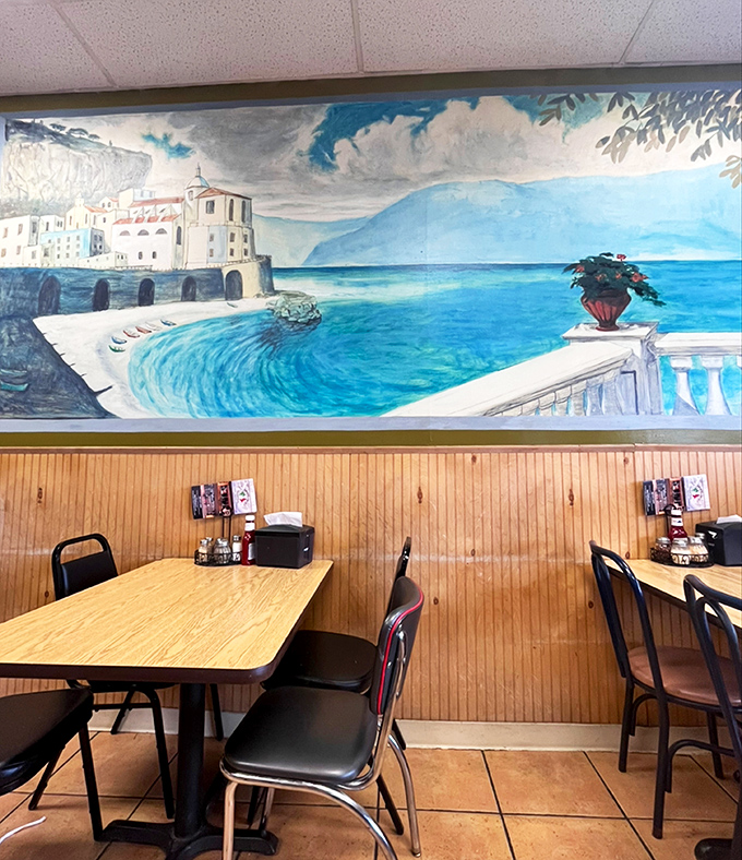 The coastal Italian mural transforms your Tuesday night dinner into a Mediterranean getaway without the jet lag.