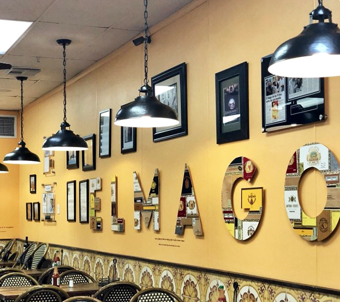 Those letters spell "MAGO" but they might as well spell "MAGIC"&mdash;the wall of fame showcasing years of culinary wizardry.