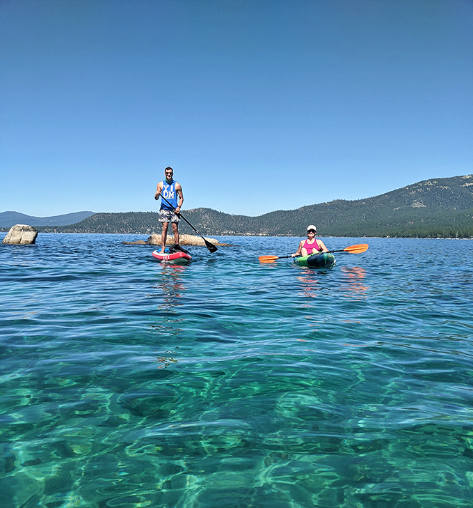 Paddleboarding on water this transparent feels like floating on liquid glass with a front-row seat to underwater wonders.