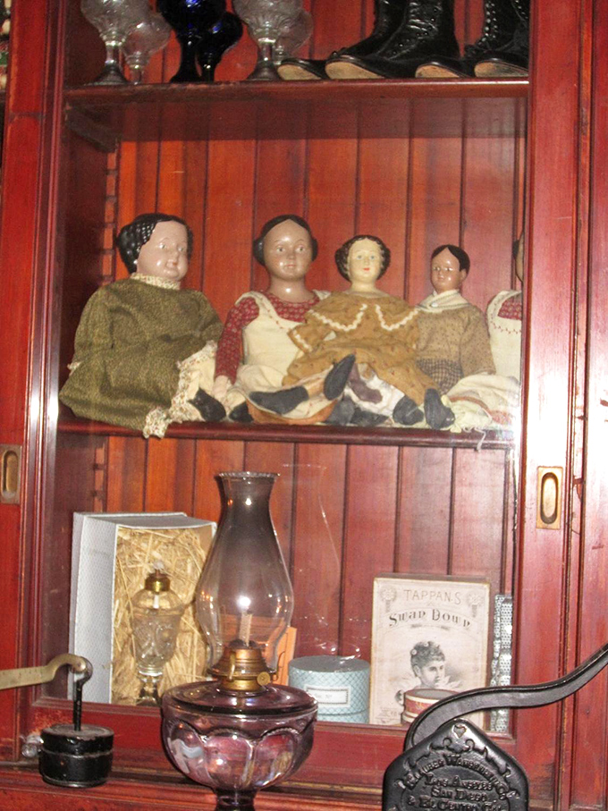 Antique dolls stare out from behind glass alongside vintage bottles&mdash;charming by day, slightly unnerving after sunset.