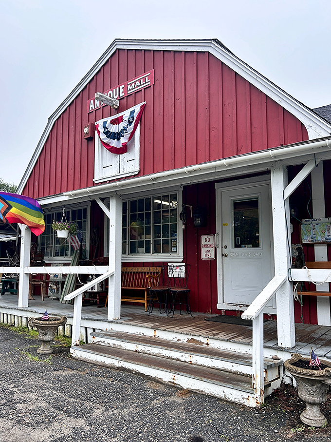 The Antique Mall's classic red barn exterior promises treasures within&mdash;where one person's discarded history becomes another's prized conversation piece.