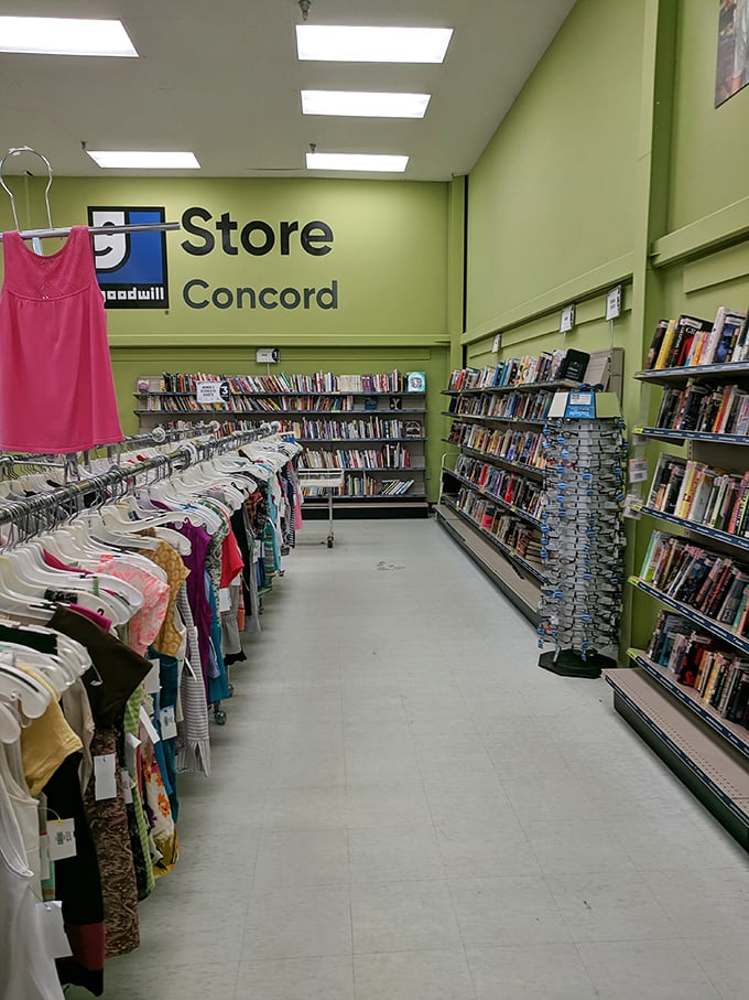 The Goodwill Store Concord sign watches over a sea of women's tops&mdash;each hanger a tiny lifeboat carrying fashion from one closet to its next adventure.