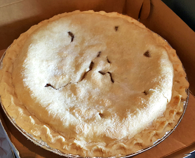 An apple pie that looks like it jumped straight out of a Norman Rockwell painting and landed on your take-home list.