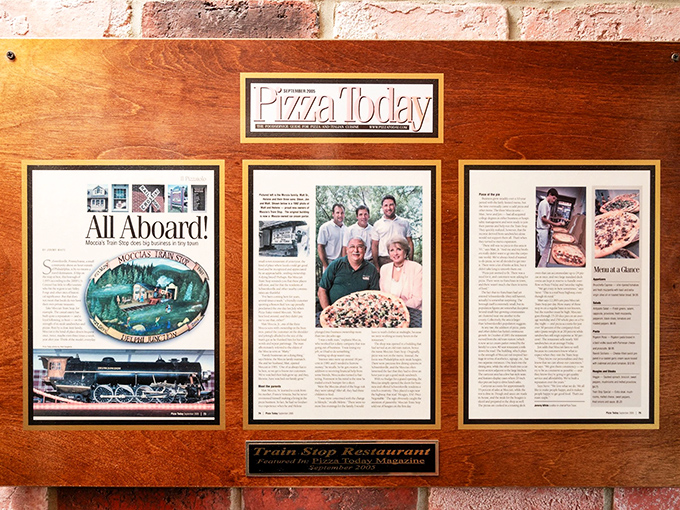 Fame looks good on this wall&mdash;framed articles from Pizza Today magazine tell the story of recognition well-earned through years of perfect pies.
