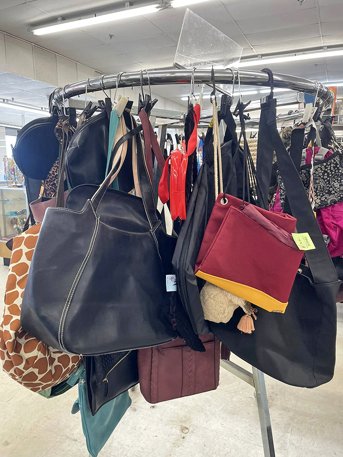 Handbag heaven on a circular rack&mdash;designer dreams and practical carryalls waiting for their next shoulder to ride.