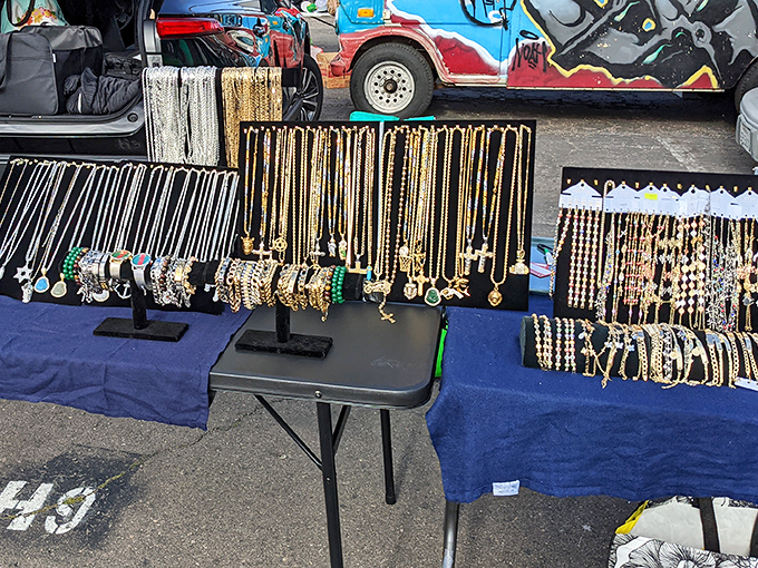 Gold chains catching the light like a rapper's jewelry box exploded onto a folding table &ndash; bling on a budget.