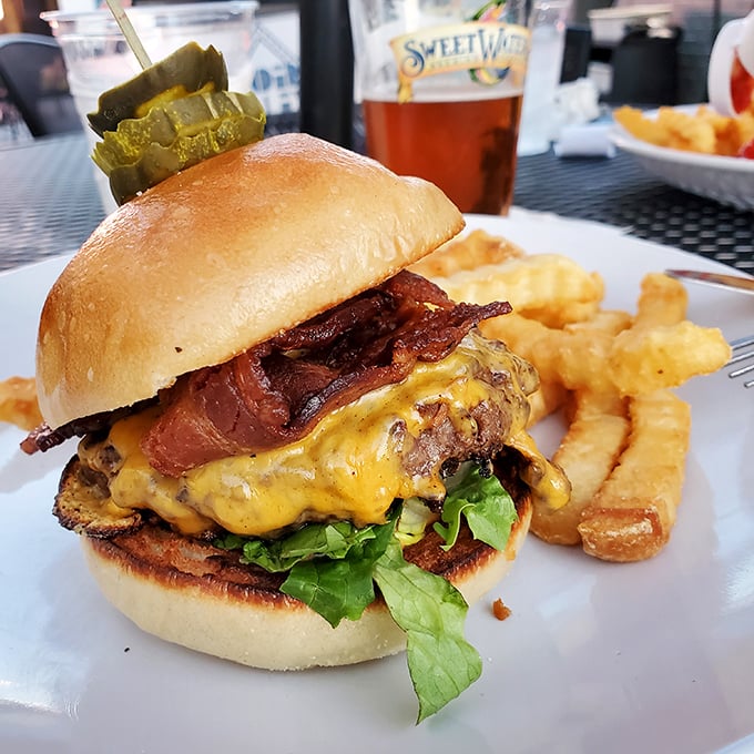 This isn't just a burger &ndash; it's a masterpiece of beef, bacon, and melted cheese that requires both hands and a strategy. The crinkle-cut fries are non-negotiable.