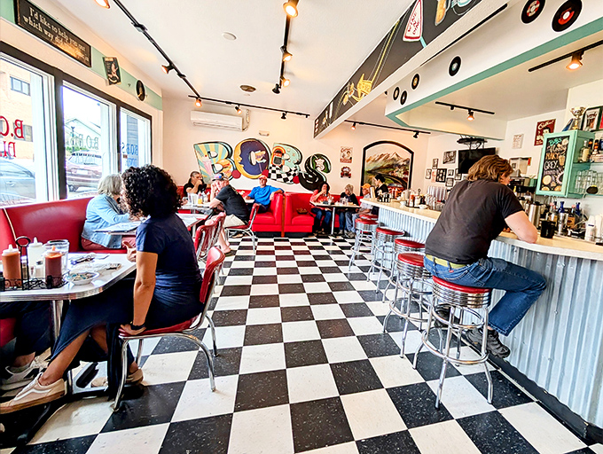 The counter at Bob's—where solo diners find community, coffee cups never empty, and the breakfast show unfolds in delicious real-time.