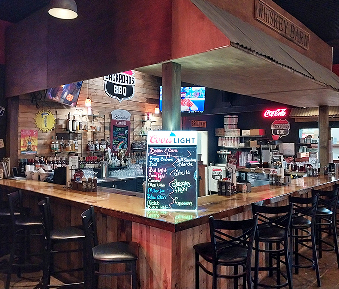 A bar that invites you to settle in and stay awhile. The wood-paneled warmth says "one more bourbon won't hurt."