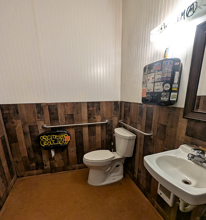 Even the bathroom gets the Shakabrah treatment&mdash;rustic wood paneling and quirky details maintain the joint's unpretentious character.