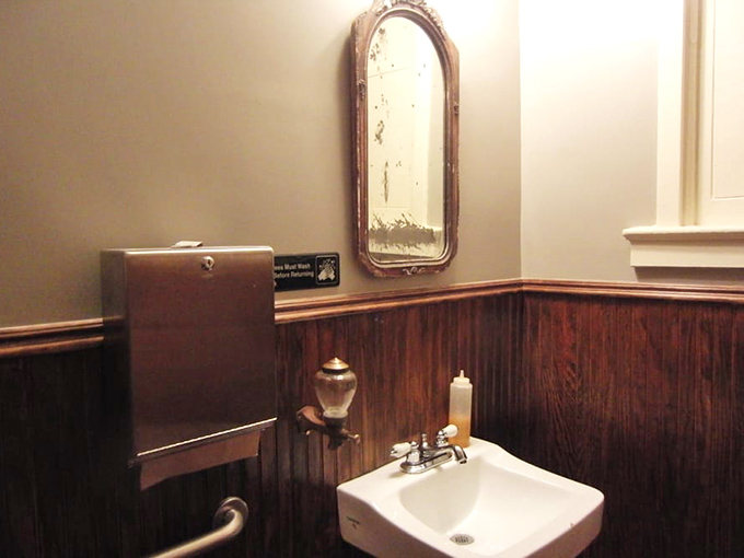 Even the bathroom maintains the vintage charm. No fancy hand dryers here&mdash;just classic fixtures that complete the old-school deli experience.