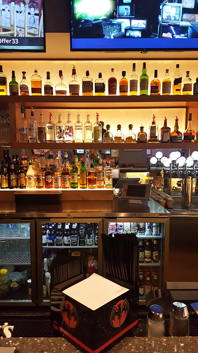 The bar's impressive lineup promises evening entertainment after your breakfast adventure. From whiskey to wine, no thirst goes unquenched here.