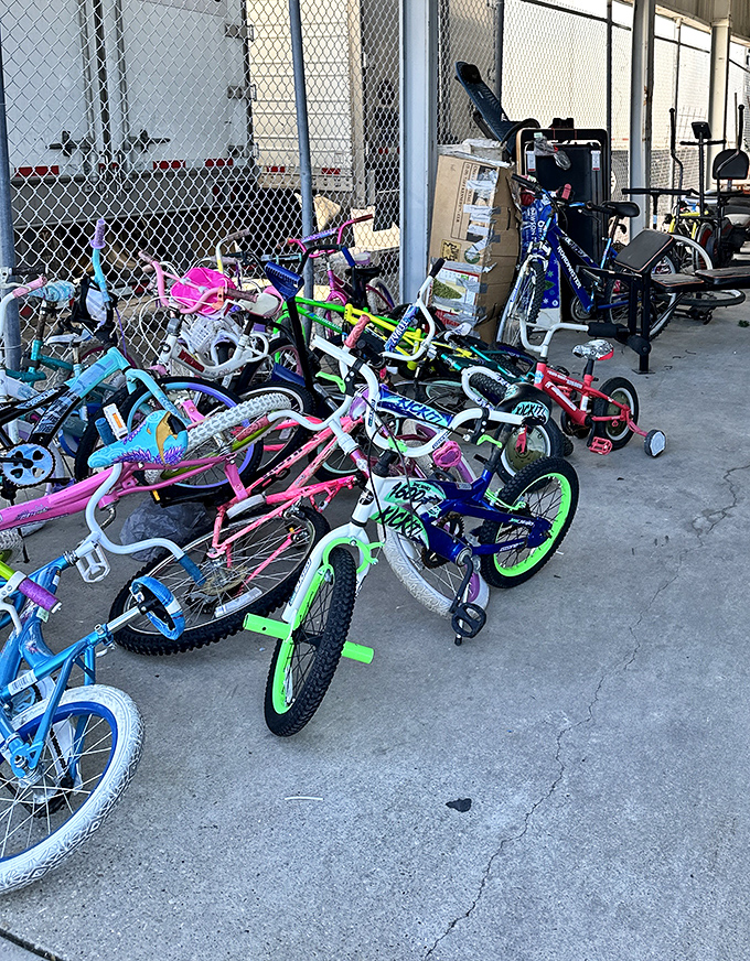 Bicycle graveyard or kid's transportation dreams? These colorful rides are just waiting for summer adventures and skinned knees.