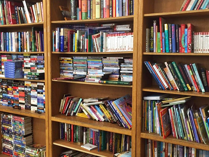 Books stacked floor to ceiling, each one waiting to transport you somewhere for less than a latte.