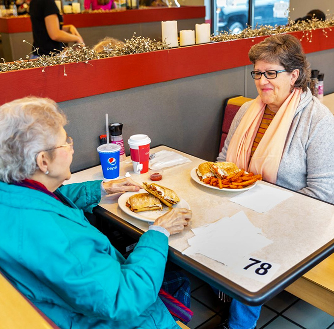 The dining area hosts regulars who've made Mr. Sticky's part of their social routine. Where sticky buns forge sticky friendships.