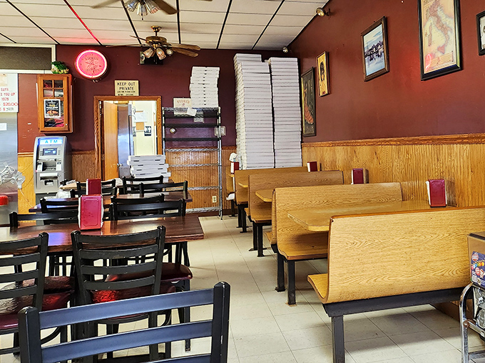 Where pizza boxes stack higher than your weekend ambitions. These booths have heard every variation of "I shouldn't, but I will" ever uttered.