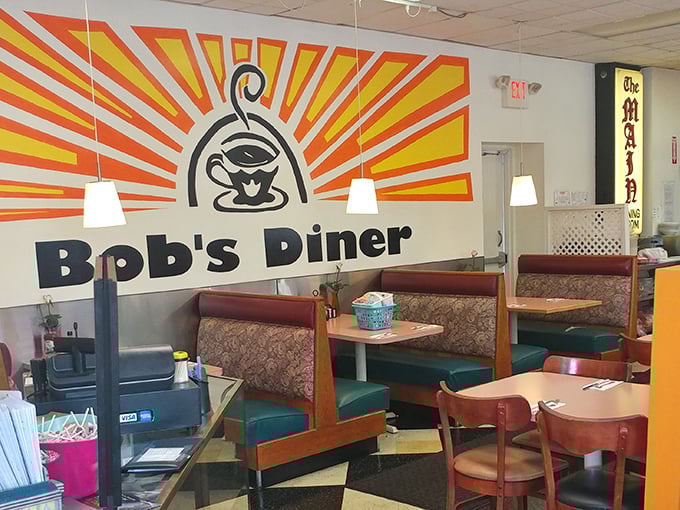 The iconic sunburst logo watches over diners like a breakfast deity&mdash;promising that in this booth, all hunger shall be vanquished. 