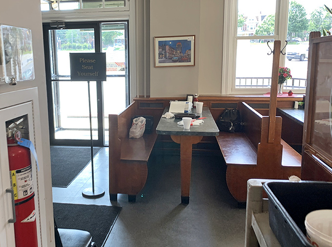 That "Please Seat Yourself" sign isn't just an instruction&mdash;it's an invitation to become part of the Ritz Barbecue family.