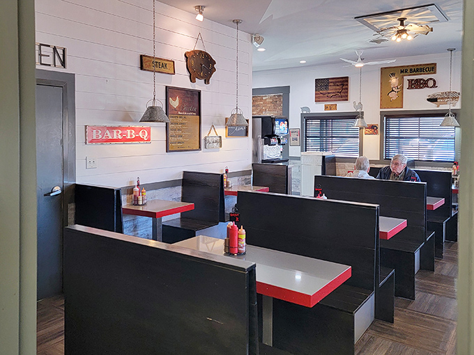 Booths designed for serious eating business &ndash; no fancy cushions or pretentious design, just comfortable seating for the important work of barbecue appreciation.