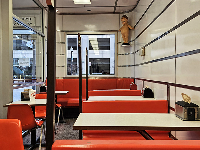 Cozy booths offer the perfect vantage point for people-watching while contemplating the important questions in life, like "Should I get another malt?"