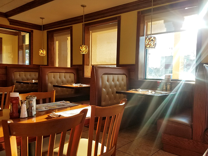 Cozy booths bathed in natural light offer the perfect setting for lingering conversations over bottomless coffee cups and plates scraped clean.