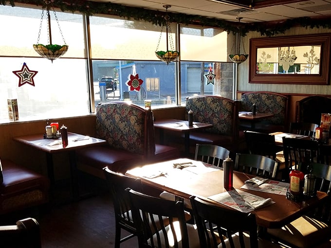 Morning light streams through windows, transforming ordinary booths into cozy sanctuaries. Stained glass pendants add that touch of "fancy" to your four-dollar toast.