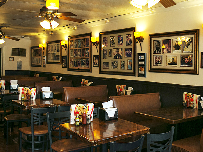 Empty booths waiting for the next round of happy diners. Those framed photos on the wall are the restaurant's family album.