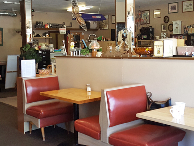 Classic diner booths in that perfect shade of red that says, "Sit here, stay awhile, order seconds." The kind of seating arrangement that's witnessed countless first dates and family reunions.