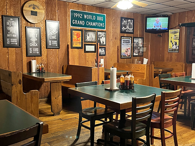 Green-topped tables and wooden booths create the perfect backdrop for the serious business of barbecue appreciation.