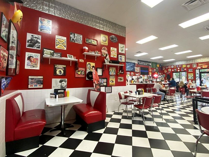 Red vinyl booths and checkerboard floors create the perfect backdrop for food that doesn't need Instagram filters to impress.