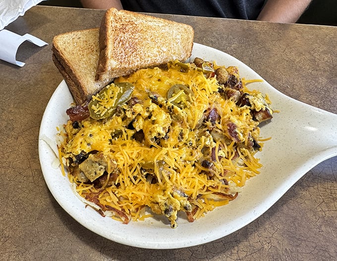 This hearty breakfast skillet topped with melted cheese is the kind of fuel that powers Midwesterners through everything from farm work to football games.