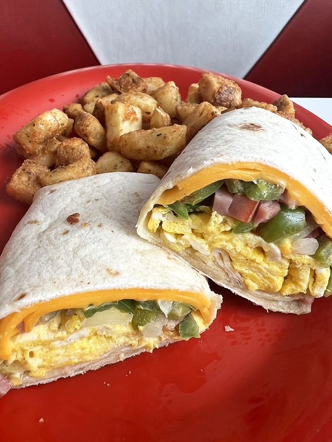 Breakfast wraps&mdash;where morning ingredients find their purpose, bundled with cheese and served with home fries that upstage everything else on the plate.