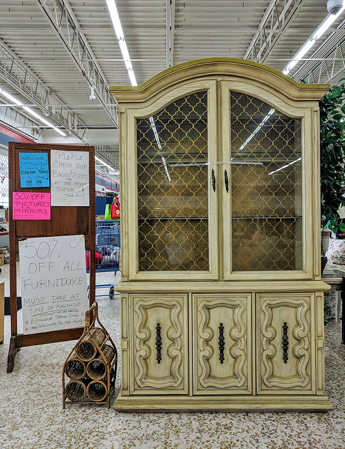 This elegant china cabinet isn't just furniture&mdash;it's architectural character for your dining room. Half the price, double the charm of anything new.