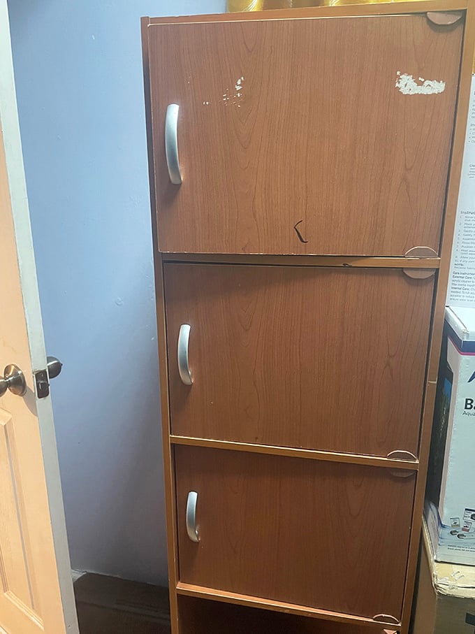 This cabinet has more potential than most dating app matches. A little TLC and it's the storage solution your hallway desperately needs.