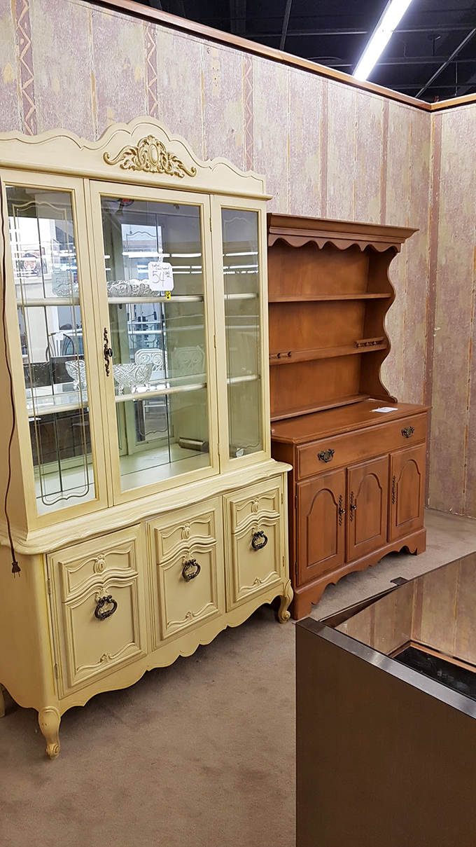 Hutch happiness in cream and maple. These vintage display cabinets stand ready to showcase your grandmother's china or your modern collectible obsessions.
