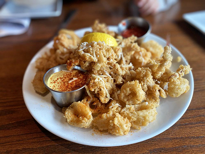 These golden calamari aren't just fried &ndash; they're transformed into crispy, tender treasures that even seafood skeptics will fight over.