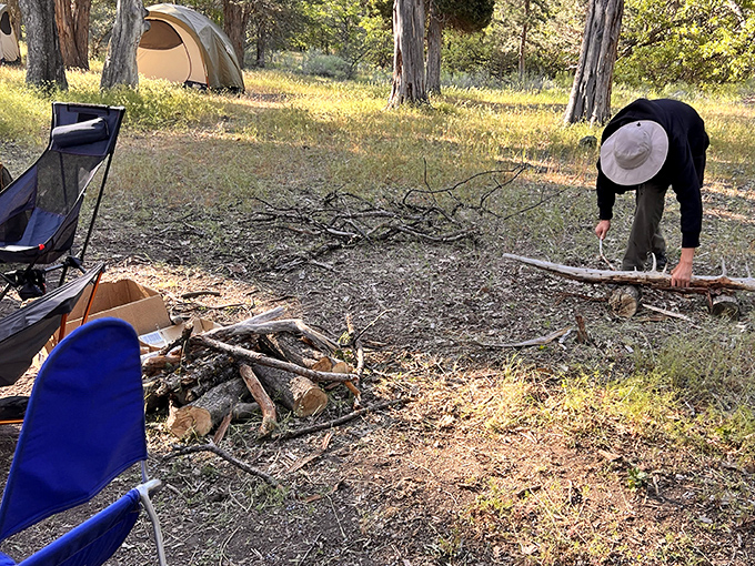 Gathering firewood becomes a treasure hunt when camping in Ahjumawi &ndash; each stick a contribution to tonight's campfire stories.