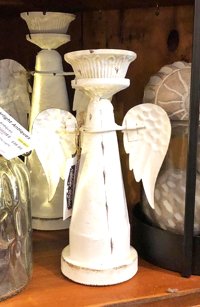 Not just angel figurines, but guardians of your mantelpiece. Their distressed white finish suggests they've been watching over homes for generations.