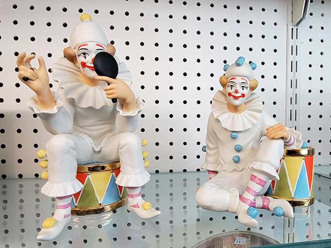 The clown figurines section: where childhood nightmares and quirky collections meet. Someone's treasured heirlooms await a new mantelpiece to haunt&mdash;I mean, grace.