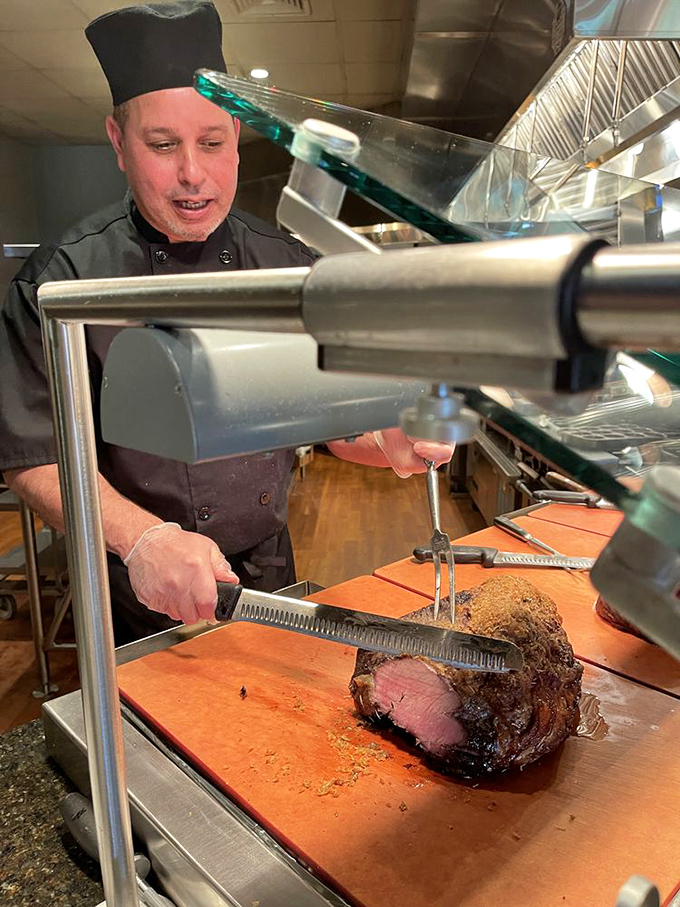 The carving station &ndash; where meat meets master. This prime rib is getting the VIP treatment it deserves before making its plate debut.