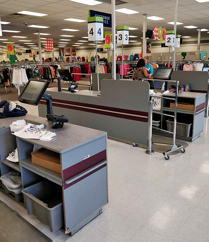 At the checkout, numbered lanes guide shoppers through the final step of their treasure-hunting expedition&mdash;victory at bargain prices!