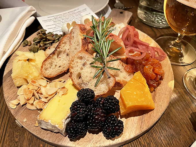 This isn't just a charcuterie board&mdash;it's a wooden stage where cheese, fruit, and bread perform their delicious symphony.