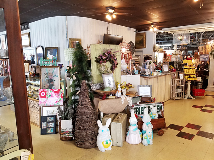 Easter bunnies mingle with artificial trees in this seasonal corner. The black and white checkered floor adds a touch of retro diner charm to this festive display.